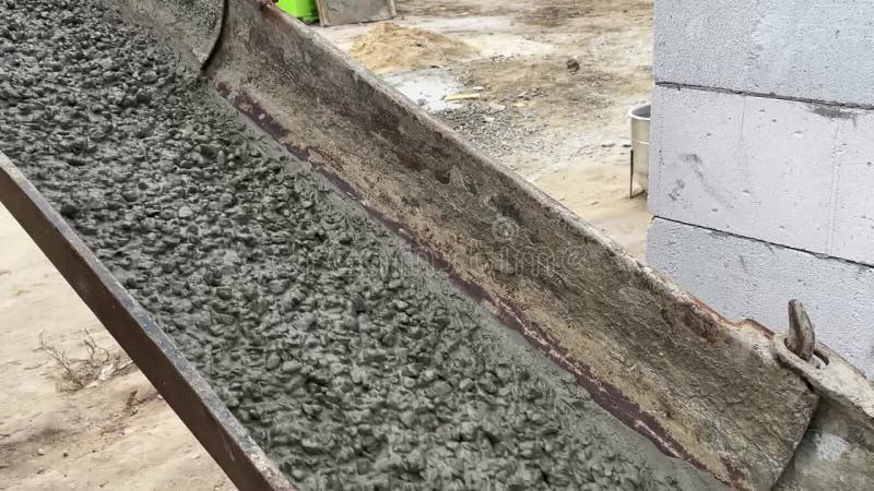 Pouring Concrete Mix on Concreting Formwork. Slow Motion Stock Footage ...