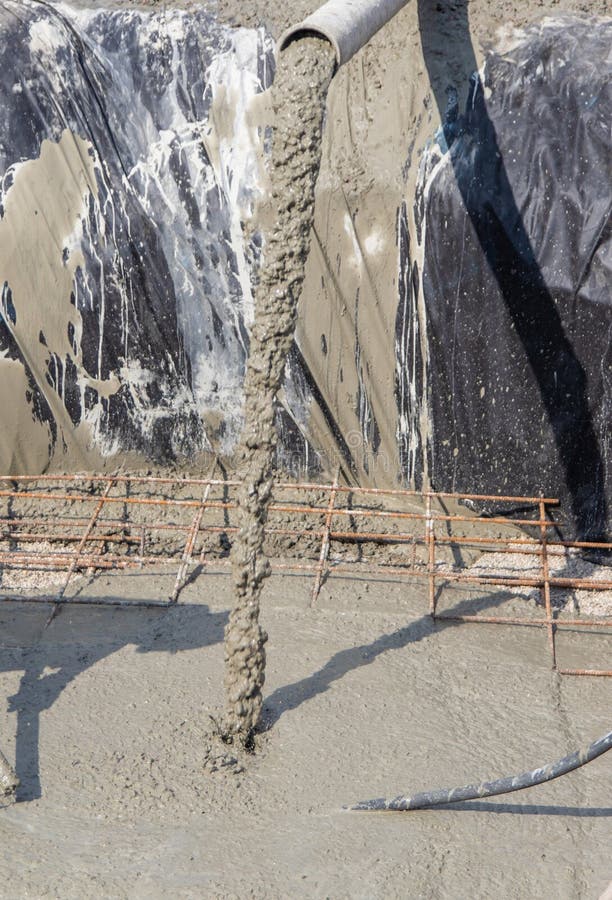 Pouring Concrete Monolith from a Machine. Selective Focus Stock Photo ...