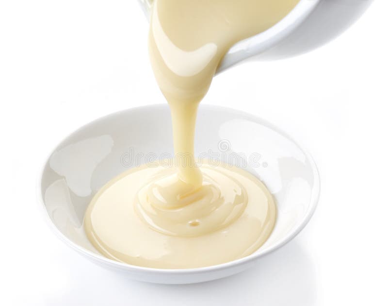 Pouring condensed milk stock photo. Image of cooking - 36958066