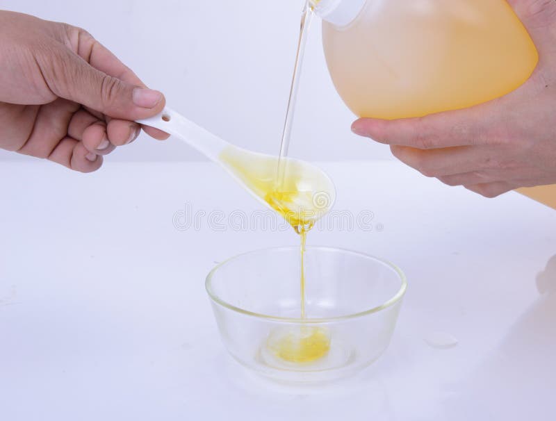 Pouring cooking oil stock image. Image of cracked, flowing - 56332963