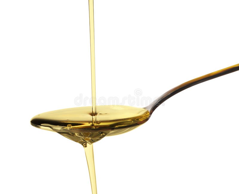 Pouring Cooking Oil into Spoon on White Background Stock Photo - Image ...