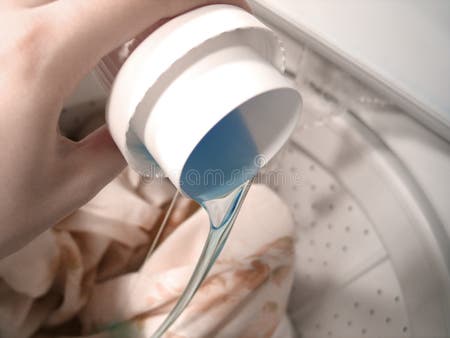 Pouring Detergent stock image. Image of rinse, laundromatneat - 9113