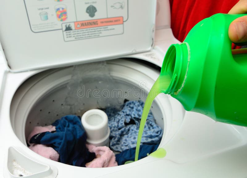 Pouring Detergent stock photo. Image of washing, machine - 19782668