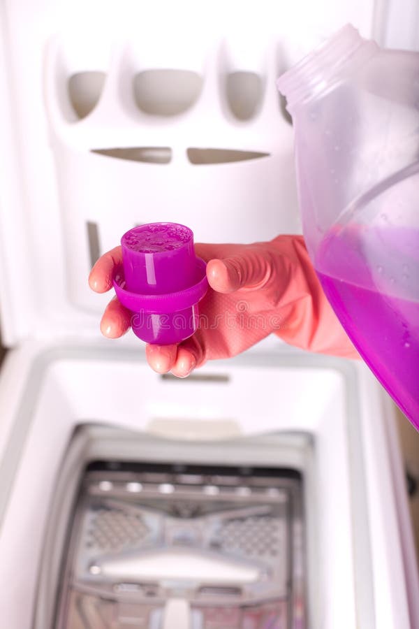 Pouring Detergent for Washing Machine Stock Photo - Image of laundry ...