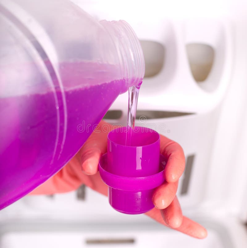 Pouring Detergent for Washing Machine Stock Photo - Image of female ...
