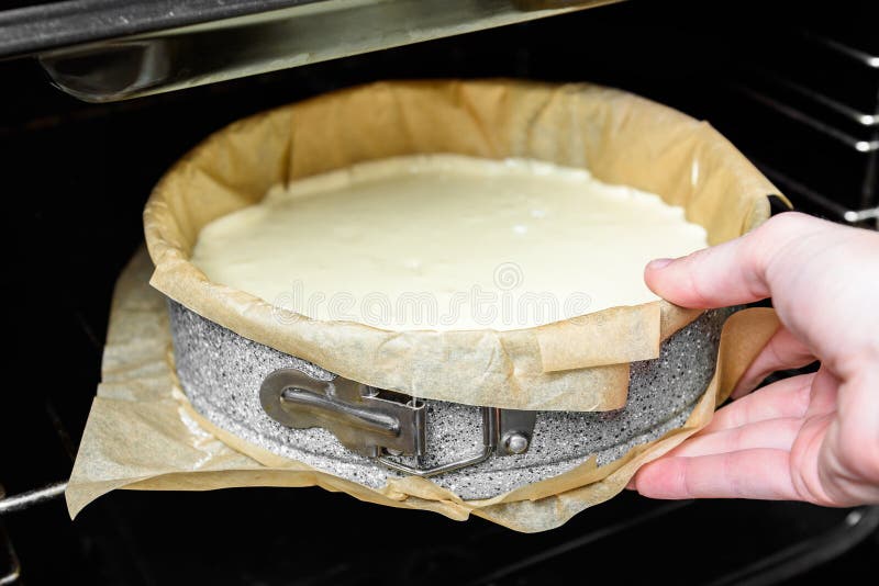 Pouring the Dough for the Cake into Metal Mold. Stock Image - Image of ...