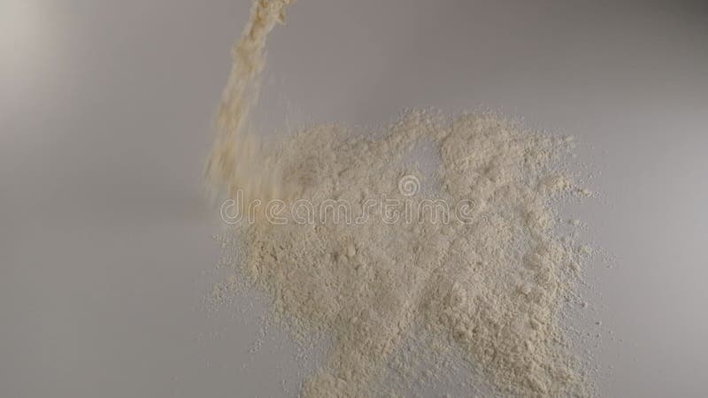 Pouring flour on the bench stock footage. Video of closeup - 278229314