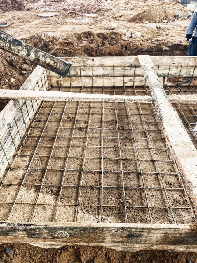 Pouring the Foundation with Concrete at the Construction Site ...