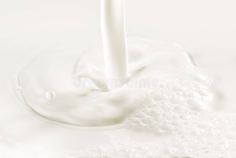 Pouring fresh milk stock image. Image of calcium, drink - 77356641