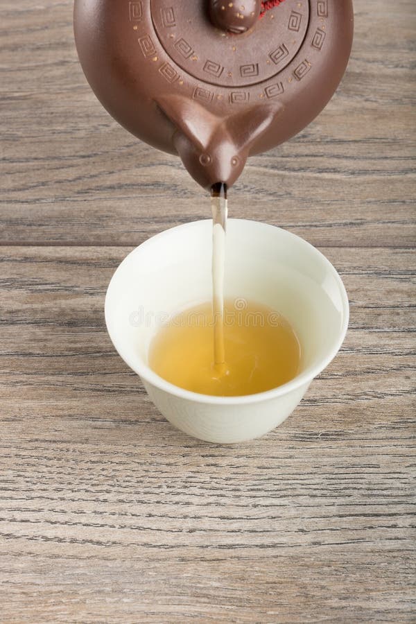 Pouring Green Tea Vertical Closeup Stock Image - Image of tannin ...