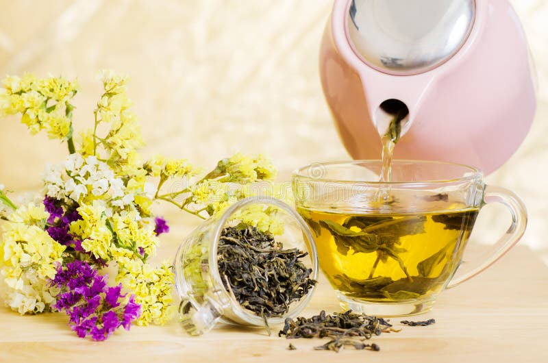 Pouring Hot Tea from Teapot into a Cup Stock Photo - Image of time ...