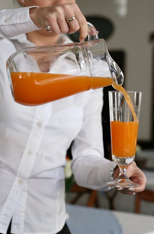 Pouring juice stock photo. Image of flow, waitress, tearoom - 9078524