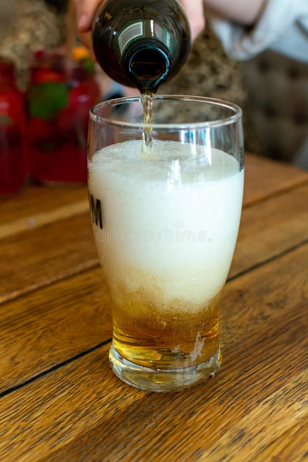 Pouring of Light Lager Beer in Glass Stock Image - Image of lager ...