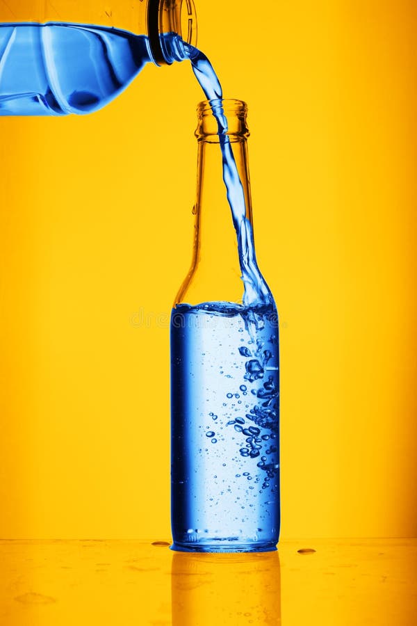 Pouring liquid stock image. Image of reflection, plastkik - 128218805