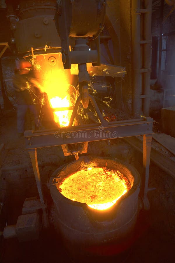 Pouring of liquid metal stock photo. Image of bright - 34161534