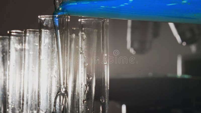 Pouring Liquid into Test Tubes. Stock Video - Video of equipment, glass ...