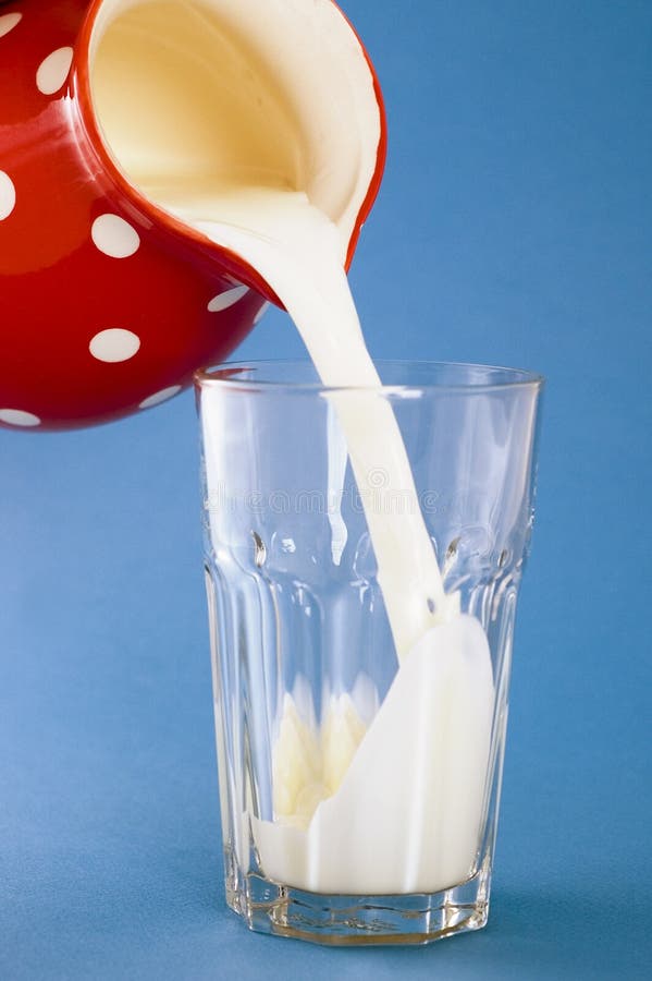 Pouring milk stock photo. Image of creamy, lactose, splashing - 15395248