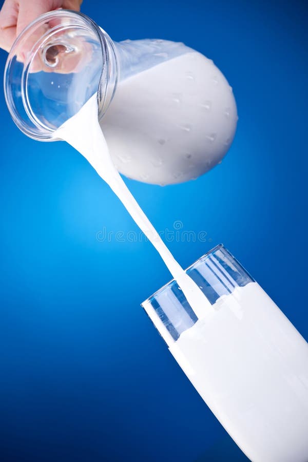 Hand Pouring Milk from Jug To Glass Stock Photo - Image of beverage ...