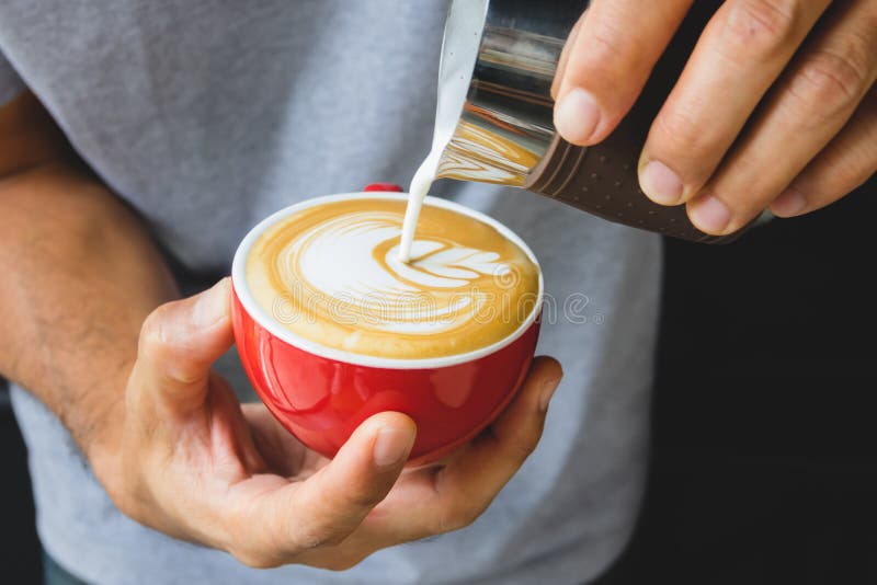 Pouring Milk from Pitcher Making Latte Art Coffee. Stock Photo - Image ...