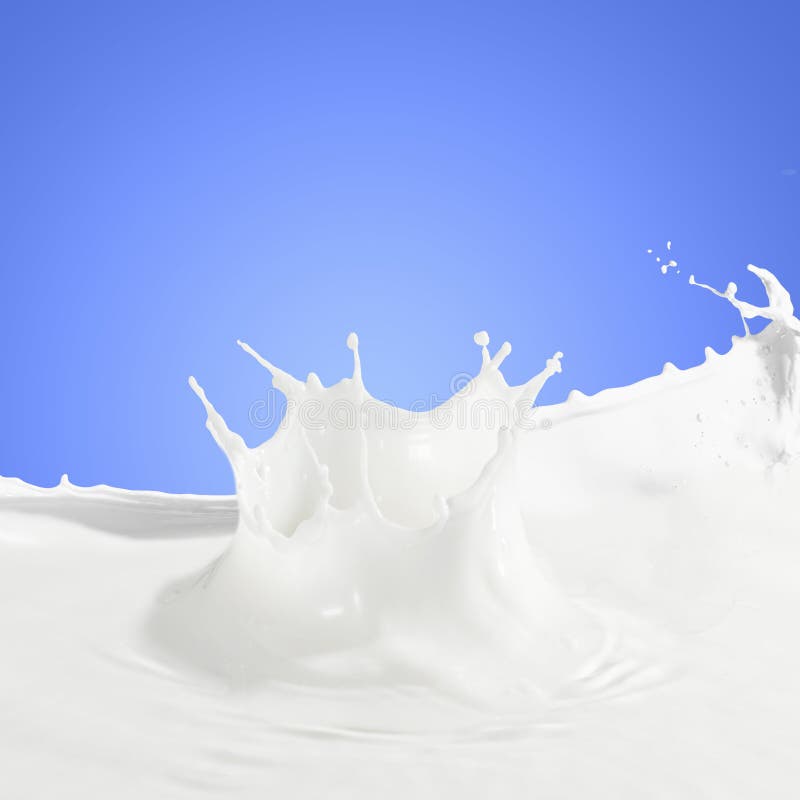 Fresh Milk Pouring into a Glass with Splash. Stock Photo - Image of ...