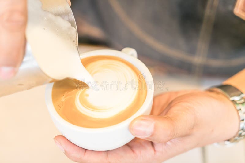 .Pouring Milk To Mix Latte Coffee Art Stock Photo - Image of hand, milk ...