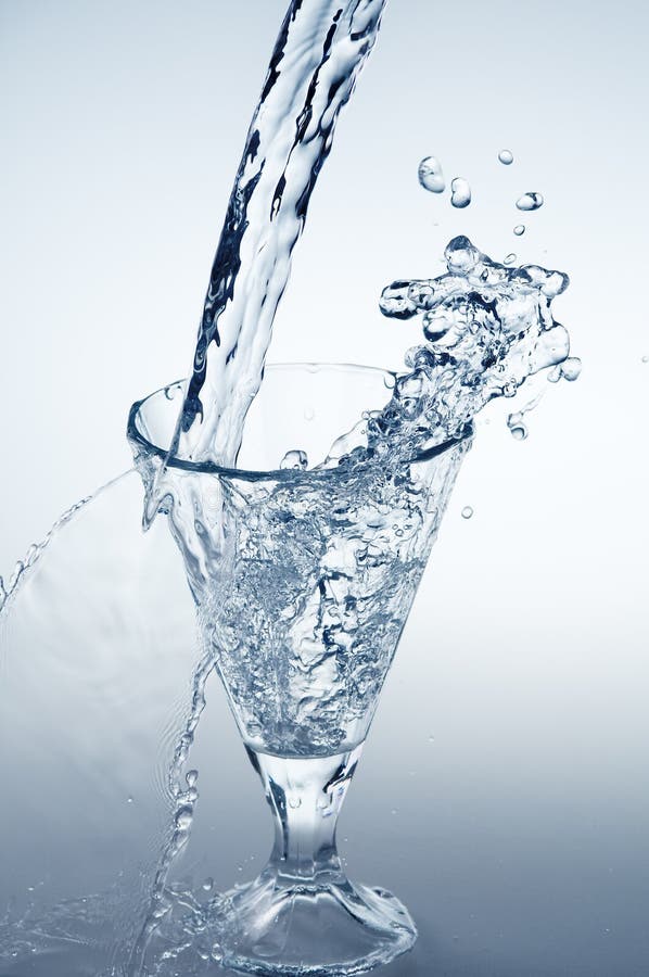 Pouring a Glass of Water stock image. Image of transparent - 8755553