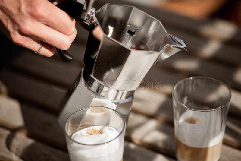 Pouring Morning Coffee from a Moka Pot Stock Photo - Image of icon ...