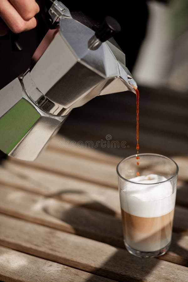 Pouring Morning Coffee from a Moka Pot Stock Photo - Image of sunny ...