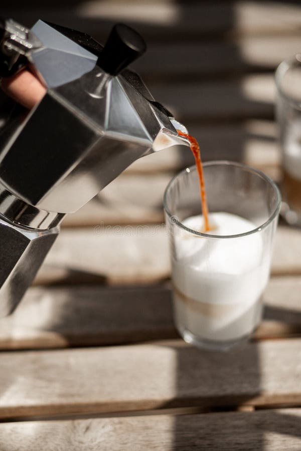 Pouring Morning Coffee from a Moka Pot Stock Photo - Image of espresso ...