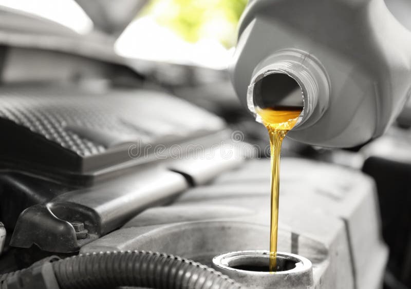 Mechanic Pouring Oil into Car Engine Stock Image - Image of maintenance ...