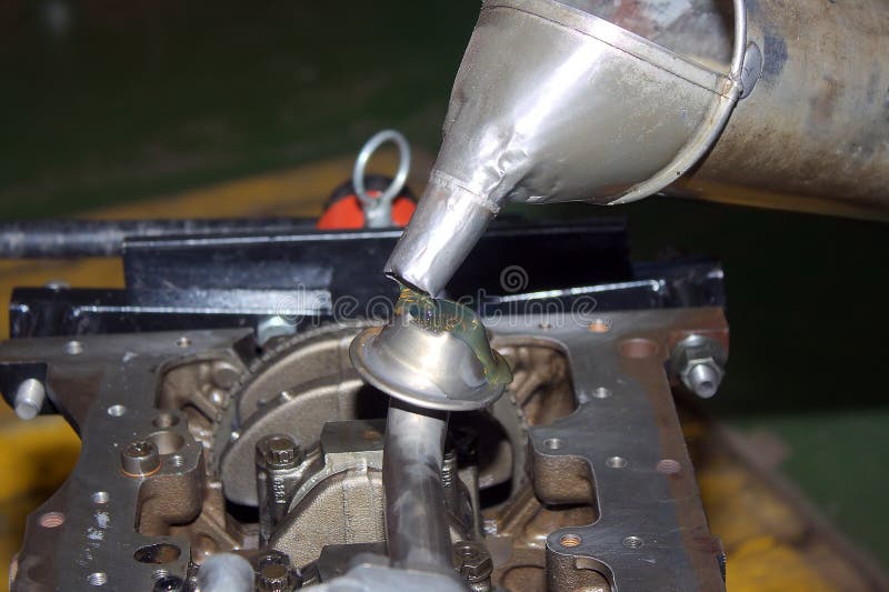 Pouring of oil for pump stock image. Image of filter - 38639821