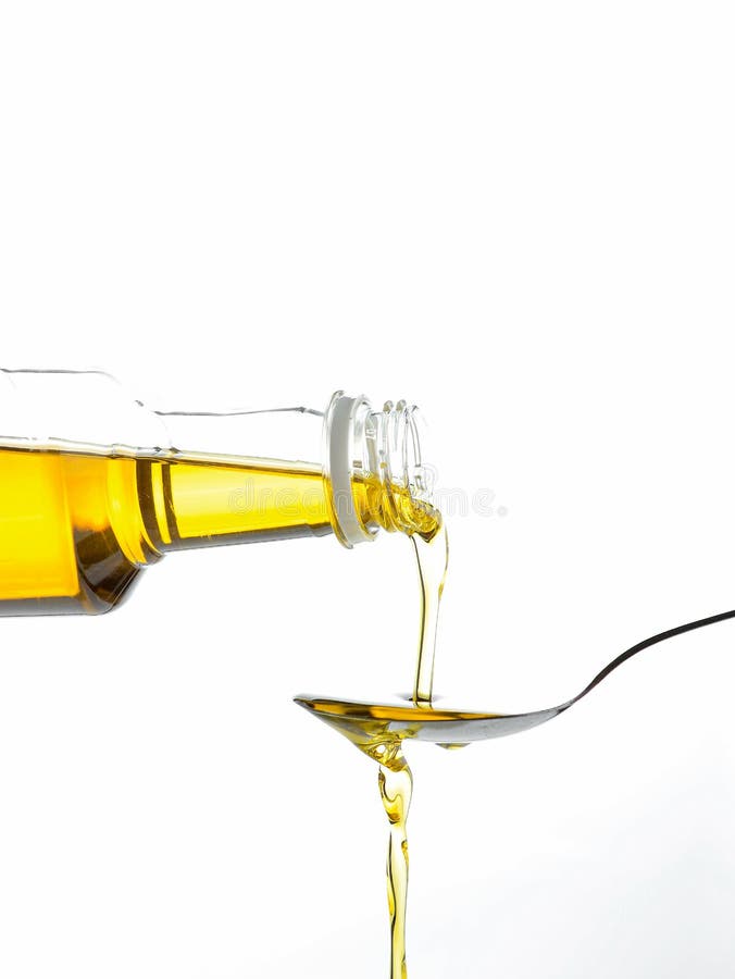 Pouring Oil on Spoon Isolated Background Stock Photo - Image of nature ...
