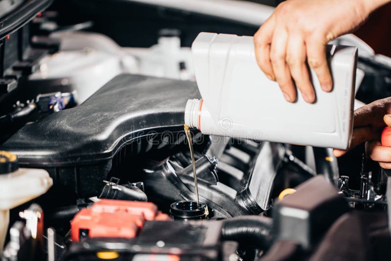 Pouring Oil To Car Engine, Closeup Stock Photo - Image of mechanic ...