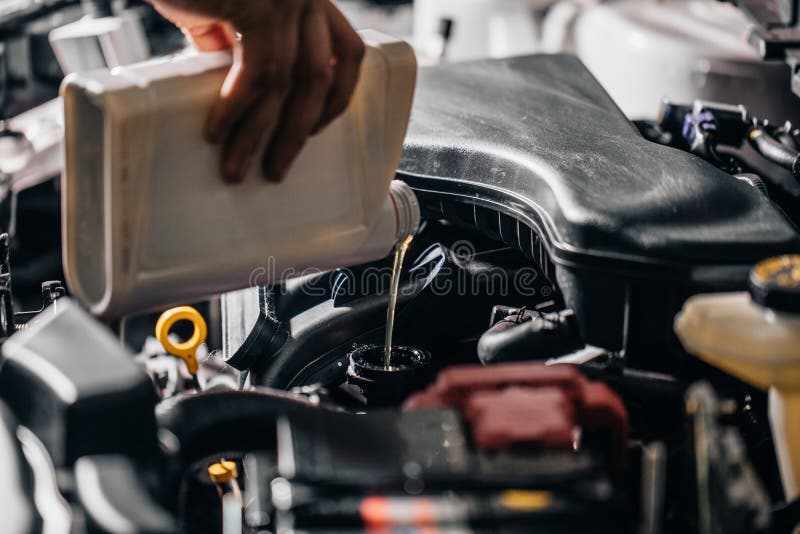 Pouring Oil To Car Engine, Closeup Stock Photo - Image of oilchange ...