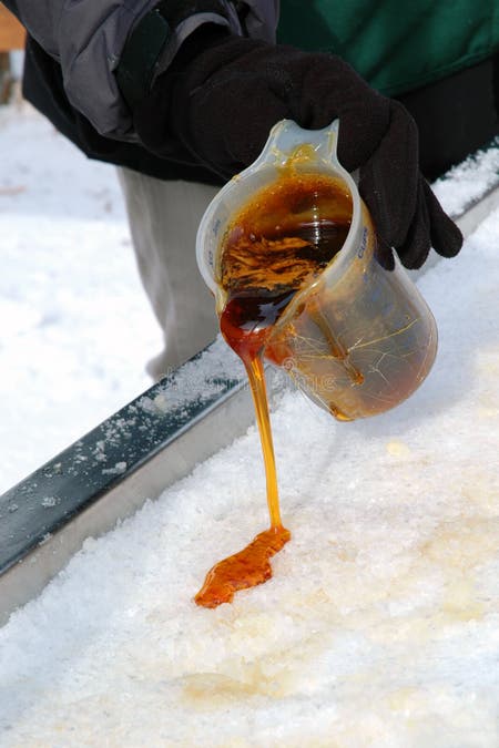 Pouring Out Maple Taffy on Snow Stock Image - Image of canadian, snow ...