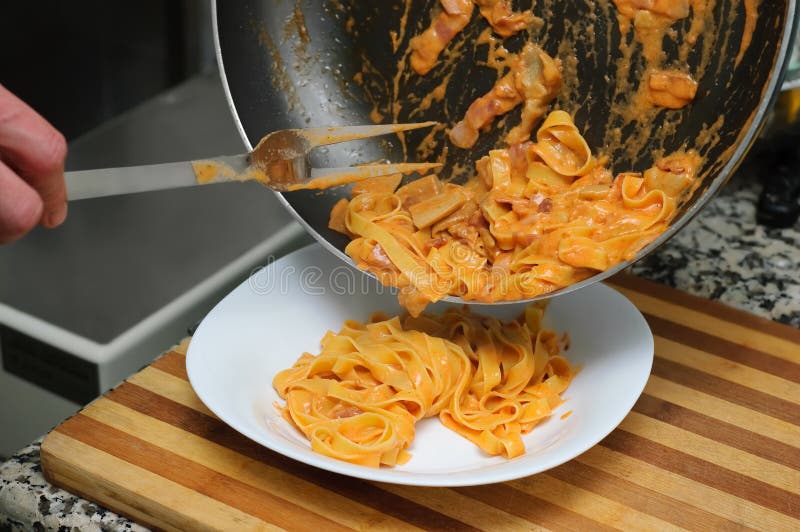 Pouring pasta stock photo. Image of yellow, preparation - 7734448
