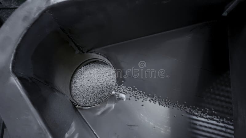 Pouring Pile of Plastic Particles. Creative. Process of Filling ...