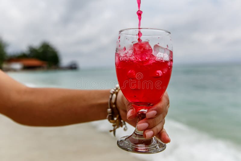 Pouring Red Soda Beverage on Summer Beach Stock Image - Image of beach ...