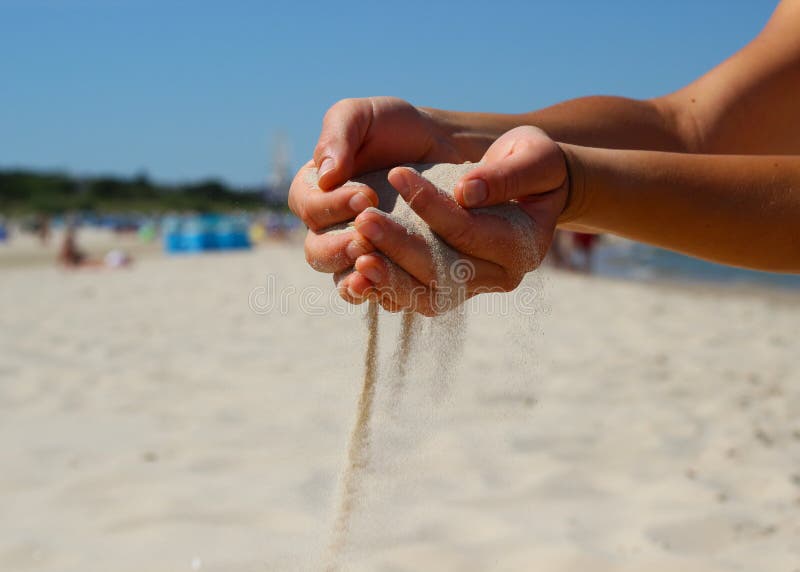 Hand Pouring Sand Stock Photos - Download 663 Royalty Free Photos