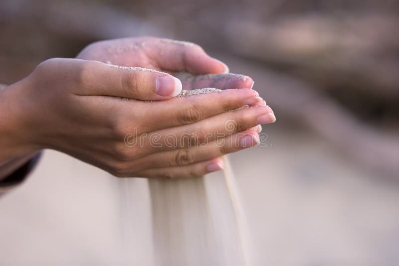 Pouring sand from hands stock photo. Image of woman, beautiful - 12007406