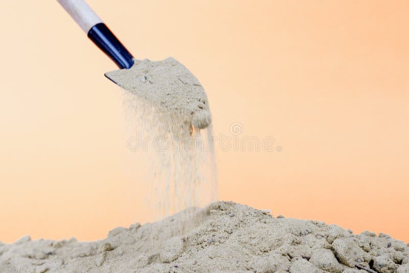 Pouring Sand from a Shovel Down into a Common Pile Stock Photo - Image ...