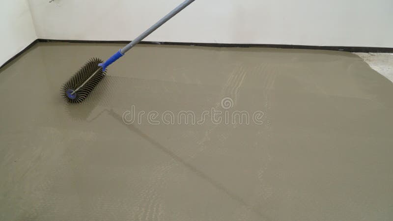 Pouring with Self-levelling Compound for Fine Leveling. the Process of ...