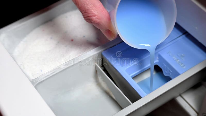 Pouring Softener in Washing Machine Drawer Stock Footage - Video of ...