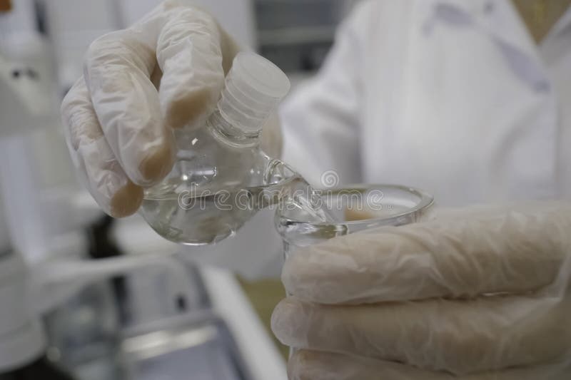 Pouring the Solution into Test Tube. Laboratory Tests Stock Photo ...
