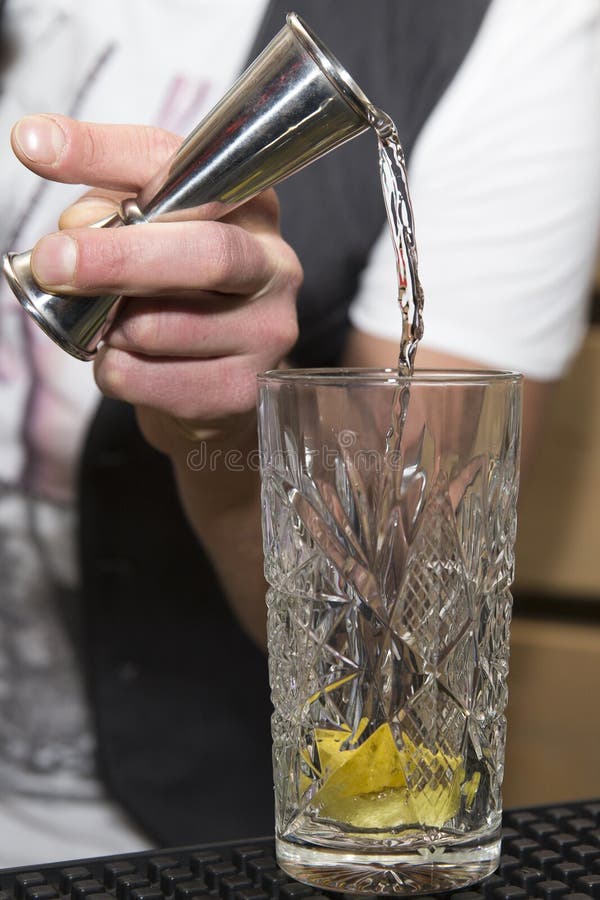Pouring some vodka stock photo. Image of decoration - 111431828