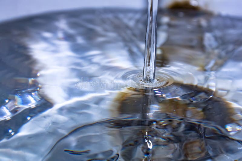 Pouring Stream of Water into the Bowl. Falling Clean Water Stock Image ...