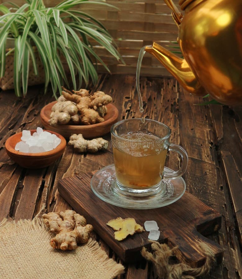 Pouring Hot Ginger Drink into a Glass Stock Image - Image of dinner ...