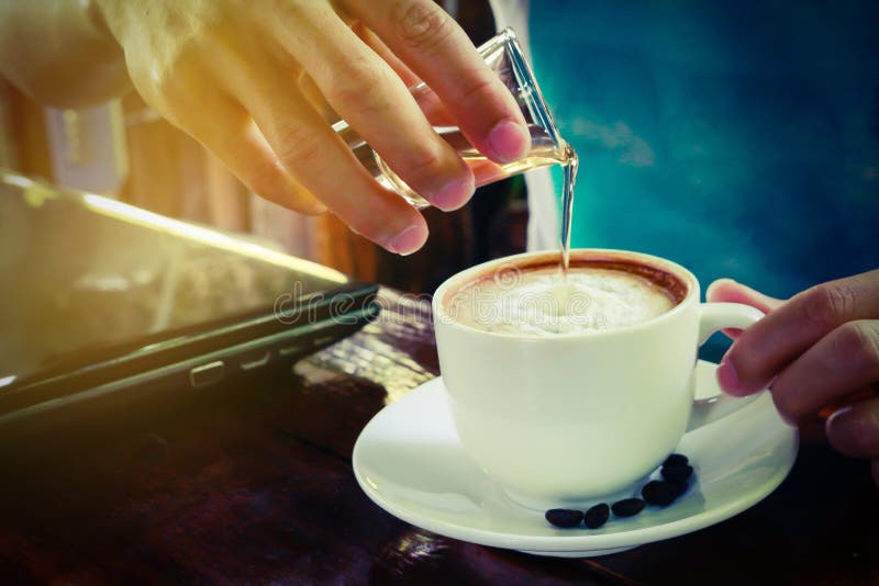 Pouring Syrup in To Latte Hot Coffee Cup Stock Image - Image of ...