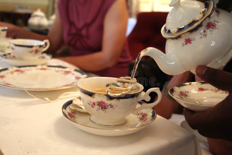 Pouring tea stock image. Image of cultured, saucer, bone - 1201331
