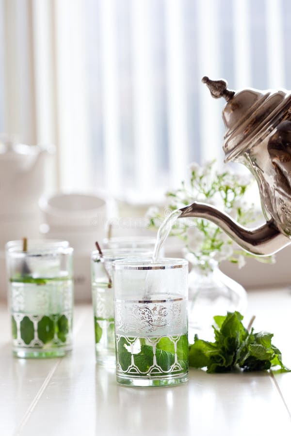 Pouring the tea stock image. Image of glass, drink, pouring - 13188369